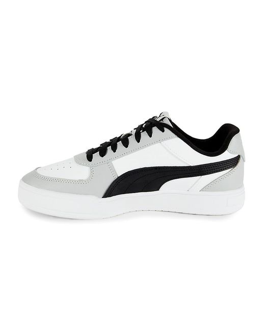PUMA Carter Perforated Leather Low Top Sneakers in Black for Men | Lyst