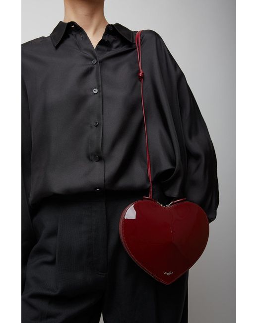 Alaïa Le Coeur Dark Red Patent Crossbody Bag | Lyst