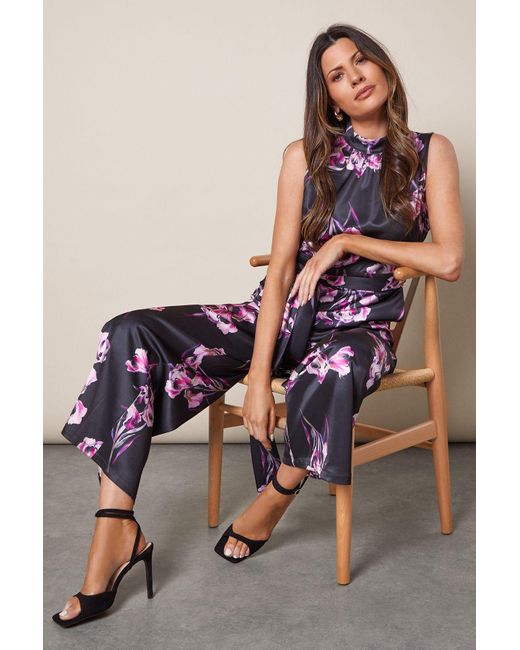 Wallis Floral Printed Satin Belted Jumpsuit in Black | Lyst UK
