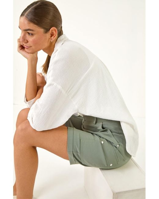 Roman Cargo Seam Short in Green | Lyst UK