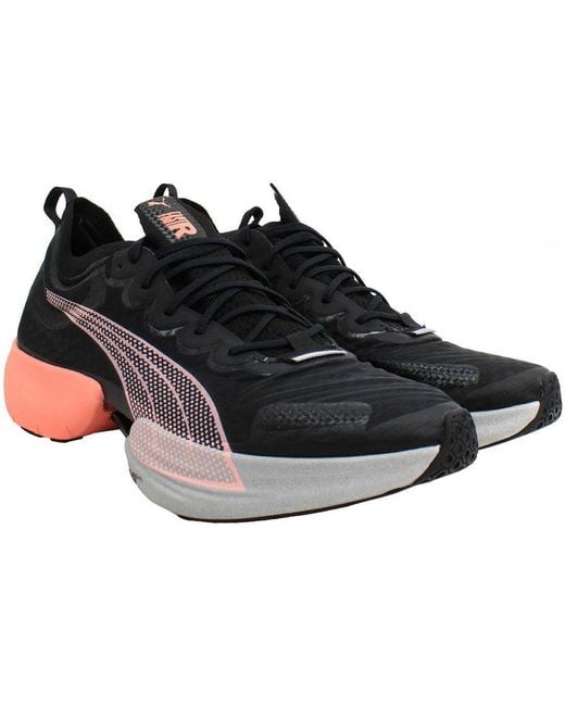 PUMA Fast-R Nitro Elite Carbon Trainers in Black | Lyst UK