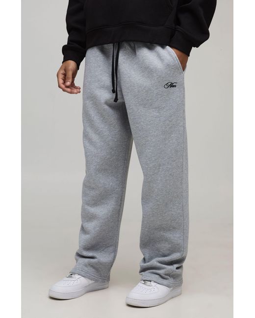 BoohooMAN Baggy Fit Script Joggers in Black for Men | Lyst UK