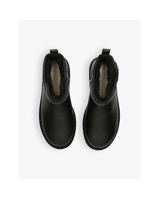 UGG Classic Ultra Mini Logo-Patch Leather Ankle Boots in Black | Lyst