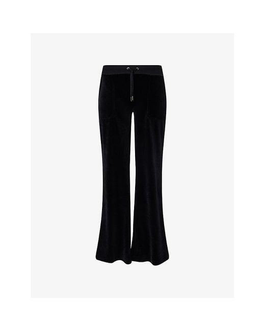 Juicy Couture Layla Flared Stretch-Woven Jogging Bottoms in Black | Lyst