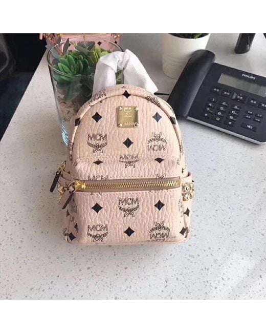 MCM Rivet Backpack in Pink | Lyst