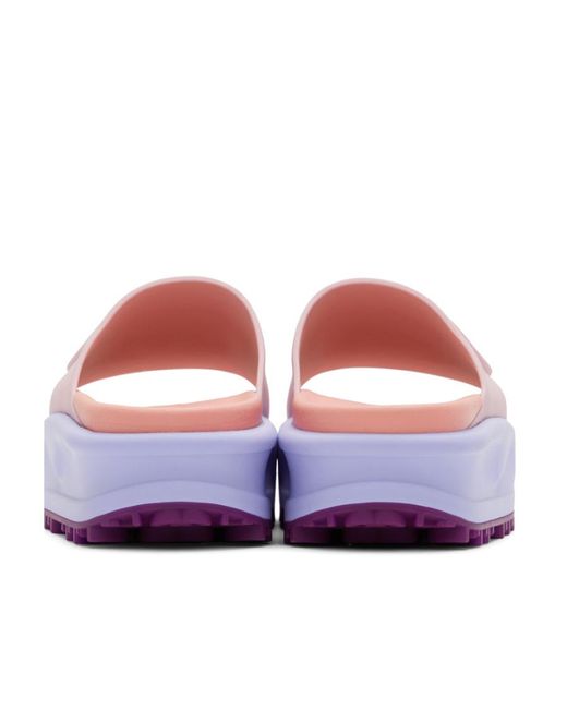 Gucci Logo-Embossed Flatform Slides in Purple | Lyst