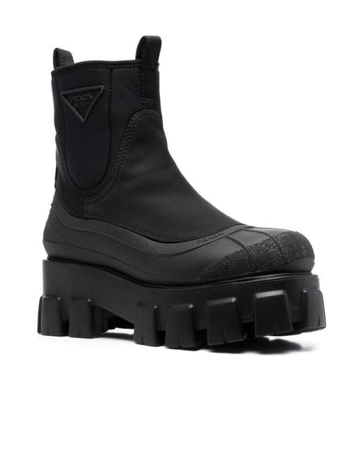 Prada Chunky Lug-Sole Ankle Boots in Black | Lyst