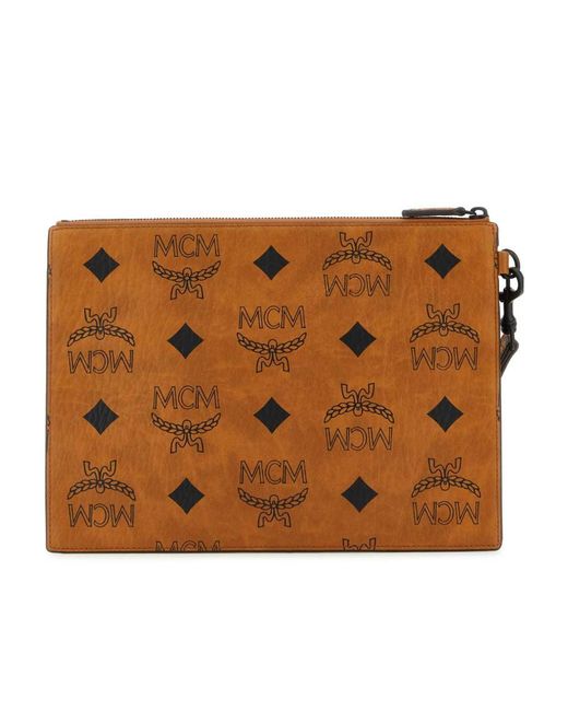 MCM Logo Pattern Clutch in Brown for Men | Lyst