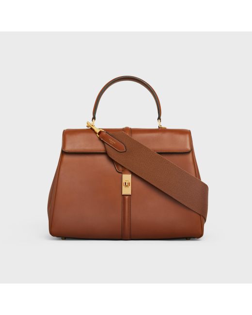 Celine Logo Strap in Brown | Lyst