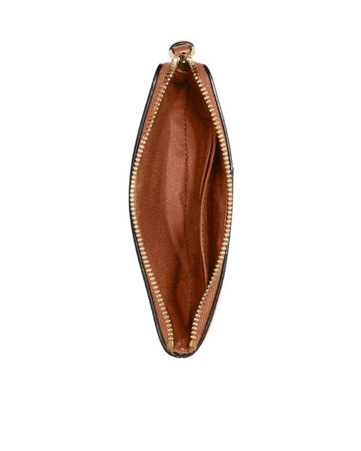 COACH Zippered Clutch in Brown | Lyst