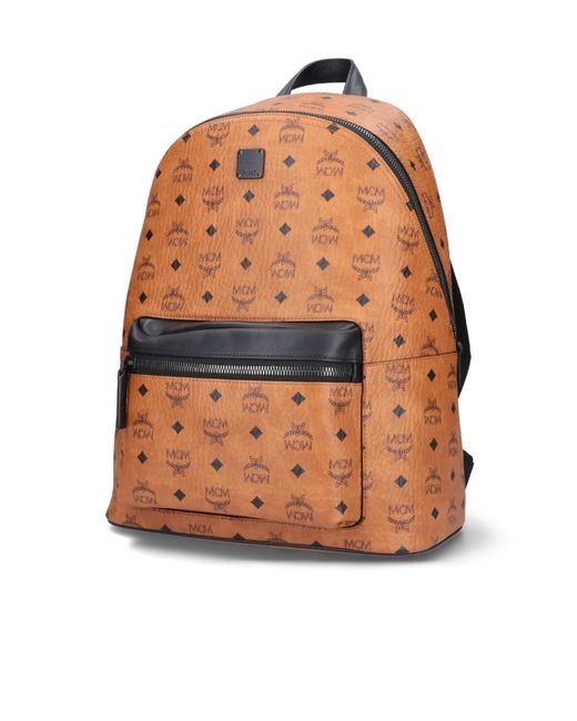 MCM Medium Stark Monogram-Print Backpack in Orange | Lyst