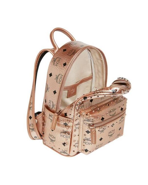 MCM Logo Printed Rivet Backpack in Pink | Lyst