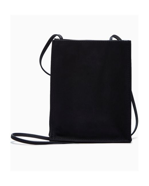 The Row To Go Crossbody Bag in Black | Lyst