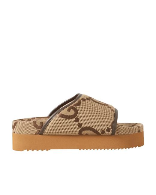 Gucci Gg Supreme Platform Slides in Brown | Lyst
