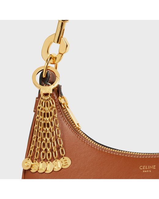 Celine Medals Charm in Metallic | Lyst