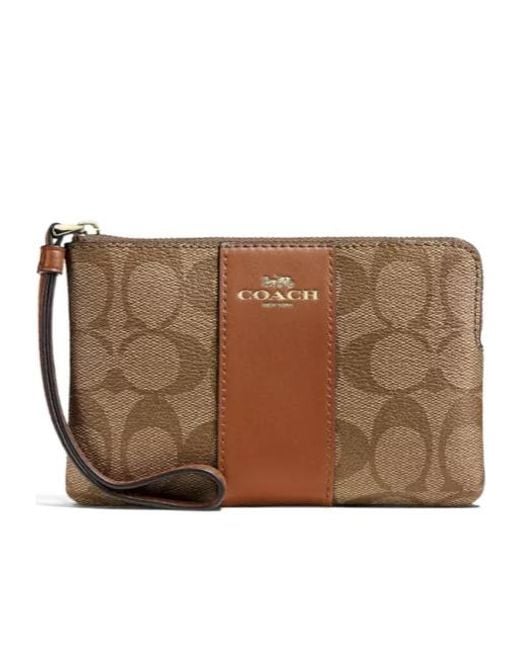 COACH Zippered Clutch in Brown | Lyst