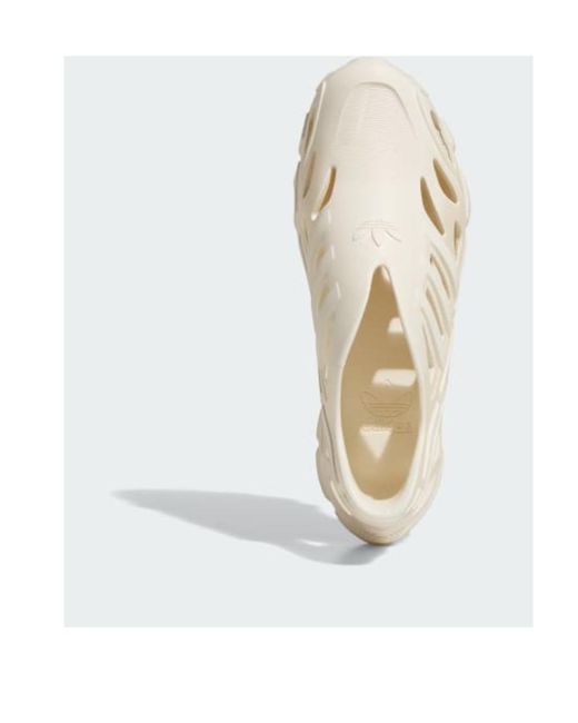 adidas Originals Logo-Embossed Perforated-Design Sneakers in Natural | Lyst