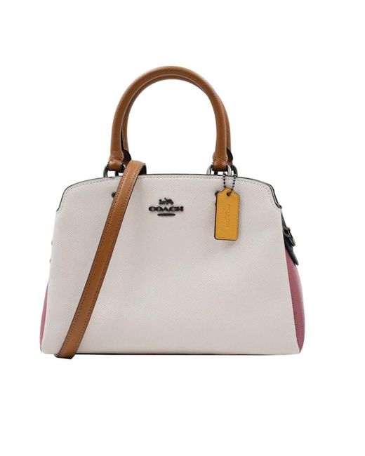 COACH Small Logo Handbag in Natural | Lyst