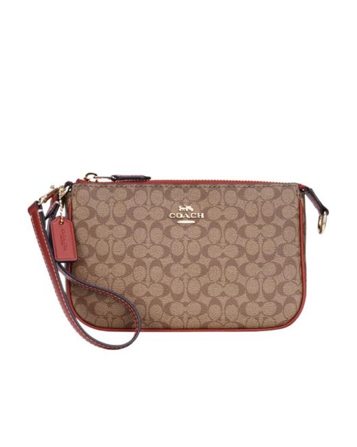 COACH Logo Hand-Held Bag in Brown | Lyst