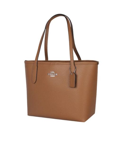 COACH Logo Decal Handbag in Brown | Lyst