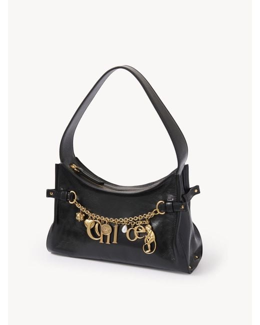 Chloé Charms Hobo Bag In Shiny Leather in Black | Lyst