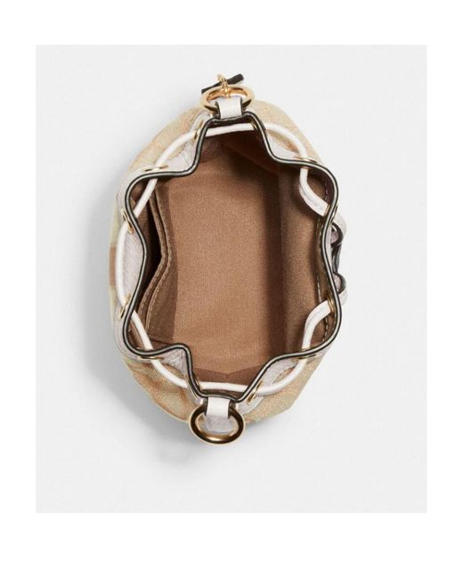 COACH Bucket Handbag in White | Lyst