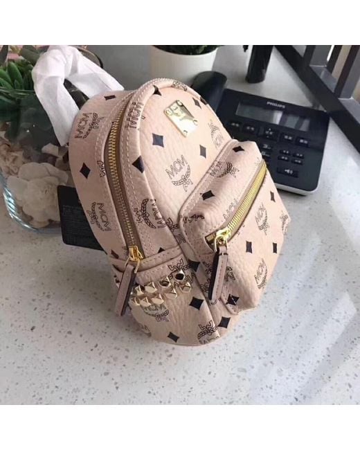 MCM Rivet Backpack in Pink | Lyst