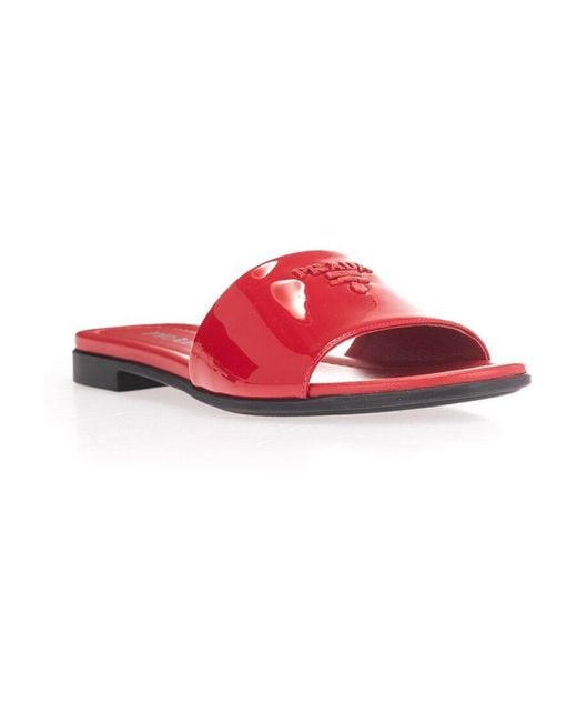 Prada Flat Bottom Logo Sandals in Red | Lyst