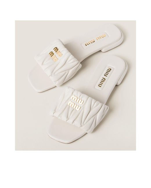 Miu Miu Matelassé Nappa Leather Slides in White | Lyst