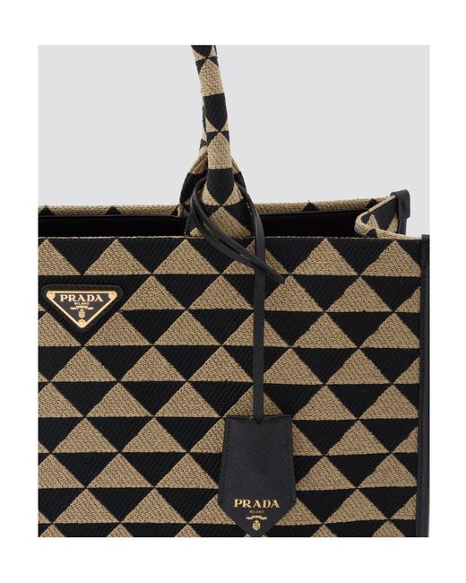 Prada Large Symbole Jacquard Fabric Handbag in Black | Lyst