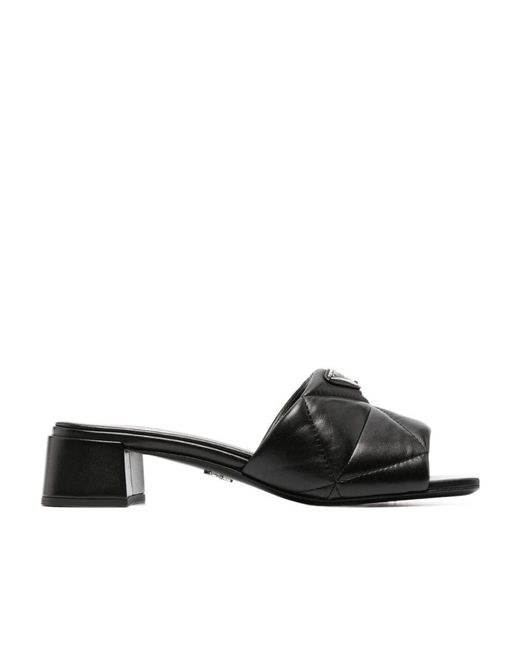 Prada Triangle Logo Quilted Mules in Black | Lyst