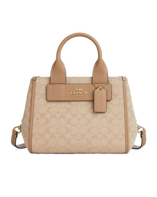 COACH Carly Carryall Bag With Signature Canvas in Natural | Lyst