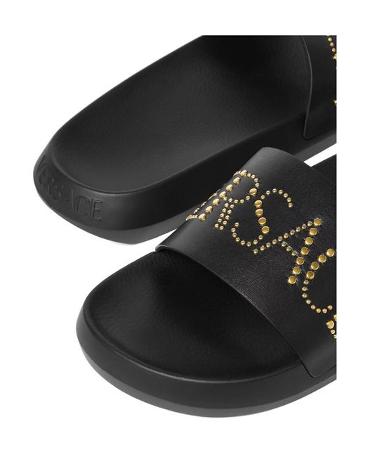 Versace Studded-Logo Leather Slides in Black for Men | Lyst