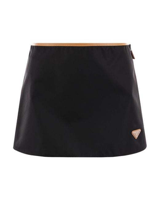 Prada Logo Patch Mini Skirt in Black | Lyst