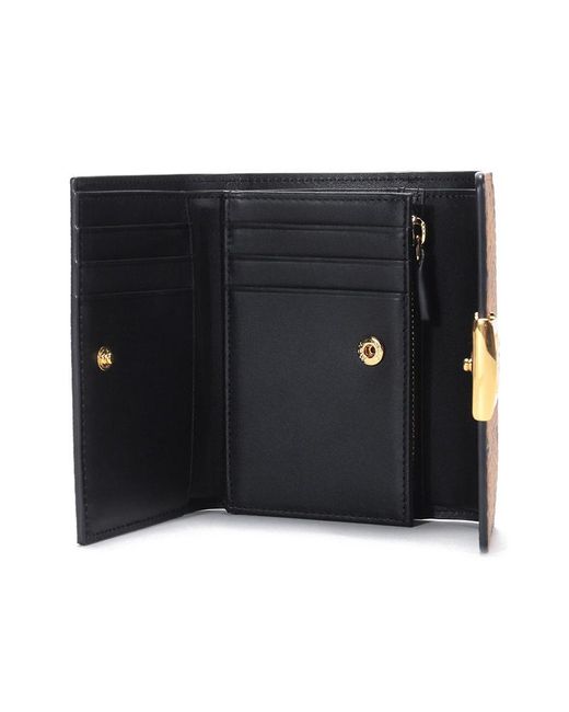 MCM Logo Pattern Wallet in White | Lyst