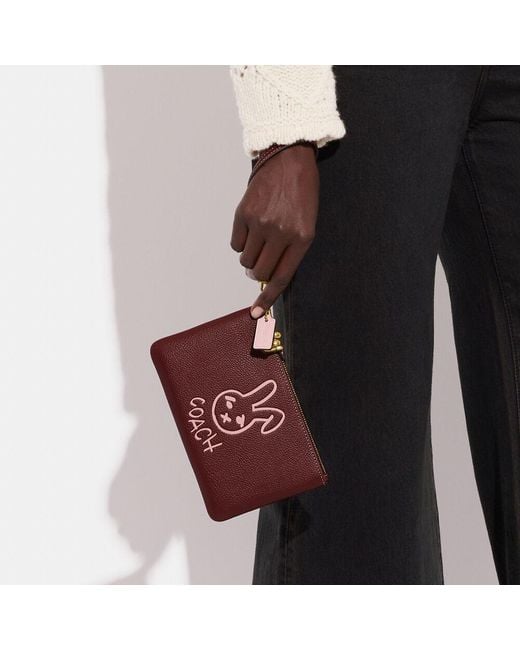 COACH Small Logo Clutch in Purple | Lyst