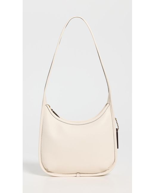 COACH Glovetanned Leather Curve Zip Bag in White | Lyst