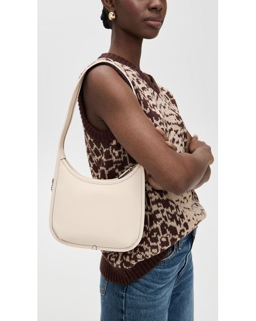 COACH Glovetanned Leather Curve Zip Bag in White | Lyst