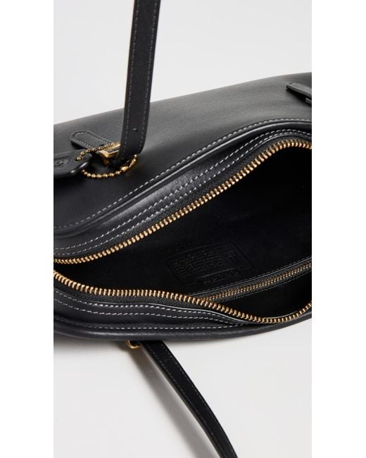 COACH Swing Zip Bag in Black | Lyst