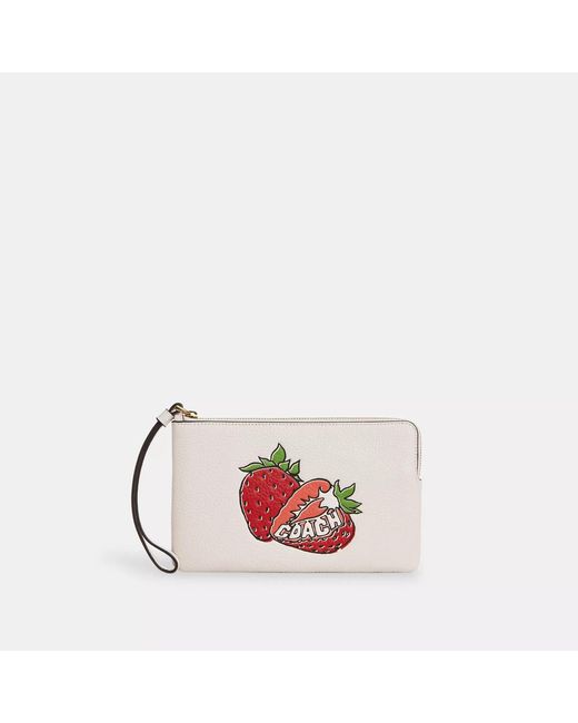 COACH Large Corner Zip Wristlet With Strawberry Graphic in Pink | Lyst