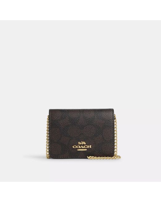 COACH Mini Wallet On A Chain in Black | Lyst