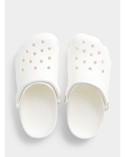 Crocs™ Classic Clogs Women in Natural | Lyst