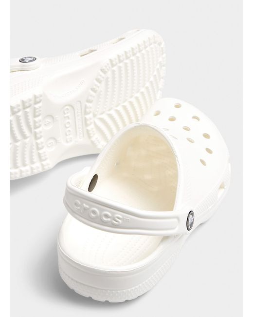 Crocs™ Classic Clogs Women in Natural | Lyst