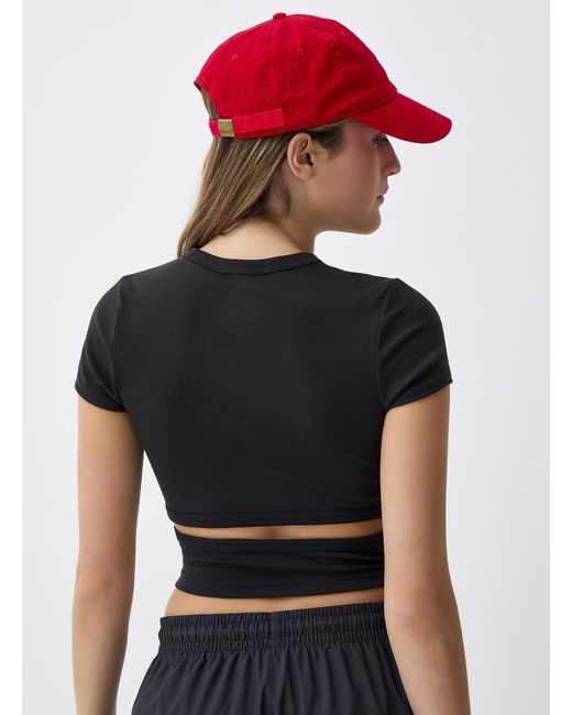 Nike Logo Open in Black | Lyst