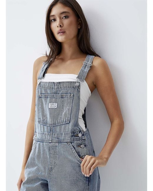 Levi's Faded Blue Denim Loose Overalls | Lyst