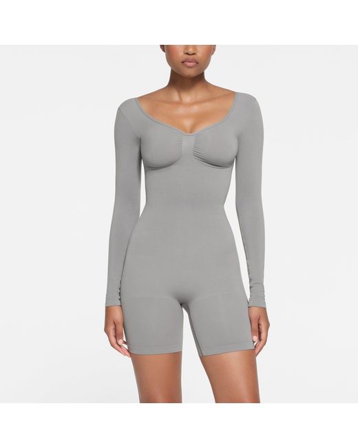 Skims Long Sleeve Low Back Mid Thigh Bodysuit in Gray | Lyst