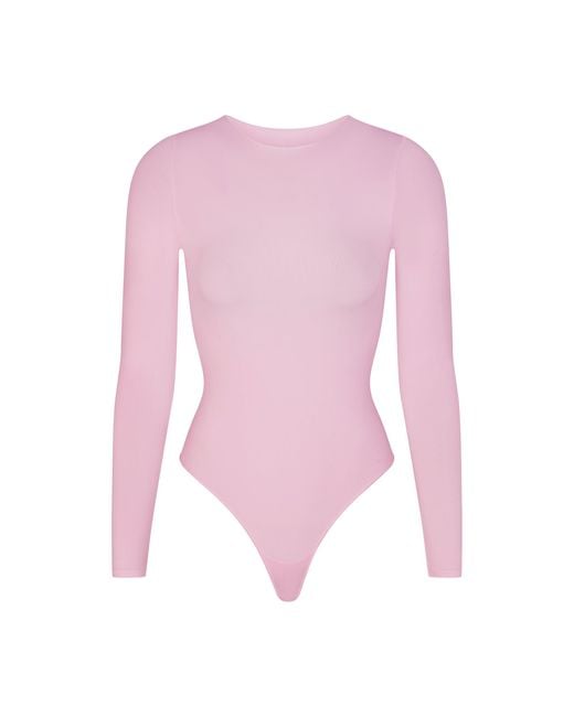 Skims Essential Crew Neck Long Sleeve Bodysuit in Pink | Lyst
