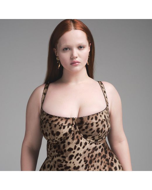 Skims Body Catsuit (Bodysuit) in Brown | Lyst