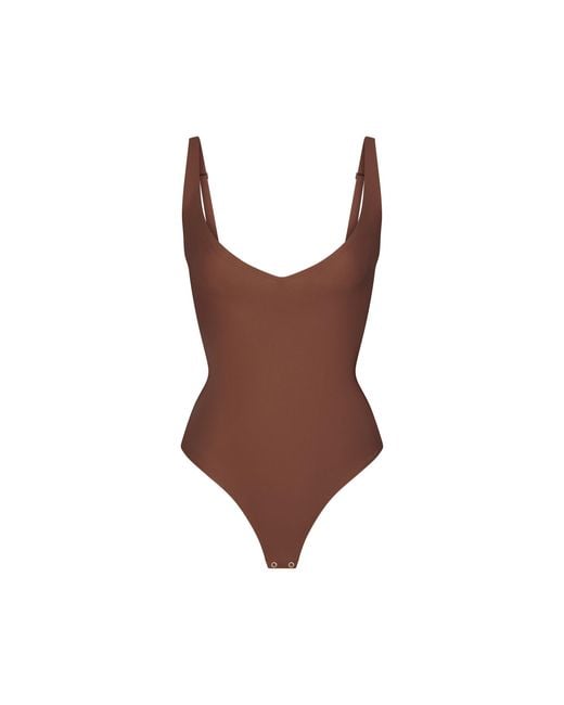 Skims Core Sculpt Plunge Thong Bodysuit in Brown | Lyst