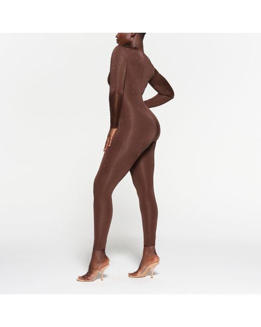 Skims Jelly Sheer Long Sleeve Catsuit Bodysuit In Brown Lyst